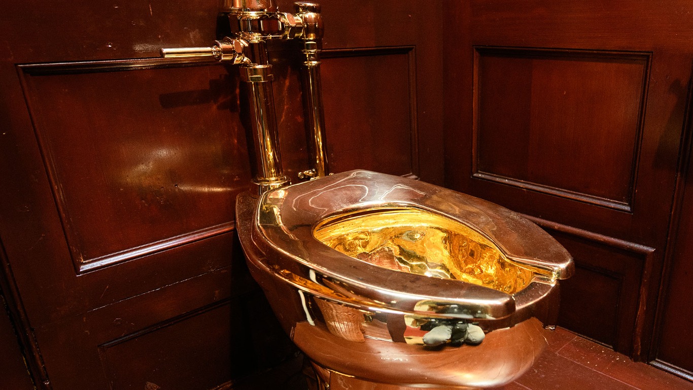 Who paid $12 million for a golden toilet?