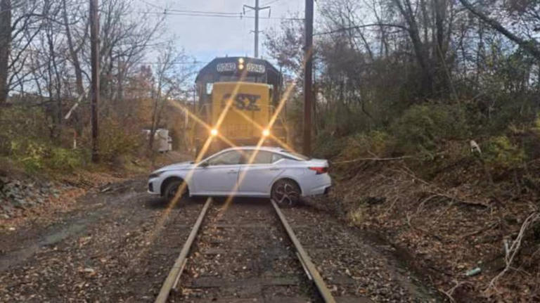 Motorist, 82, suffers only minor injuries after train drags car for ...