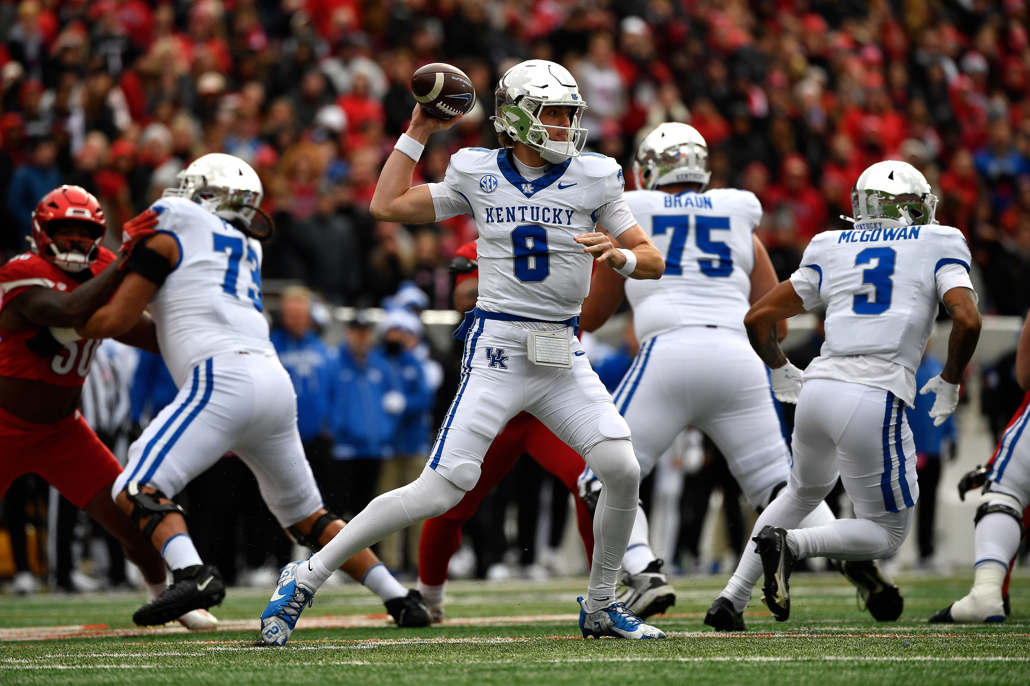 New faces for Louisville run Kentucky into the ground in 41-0 blowout