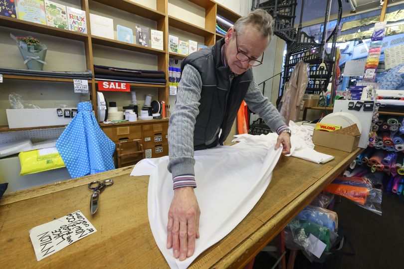 26 photos of cherished 54-year-old fabric merchants shutting up shop