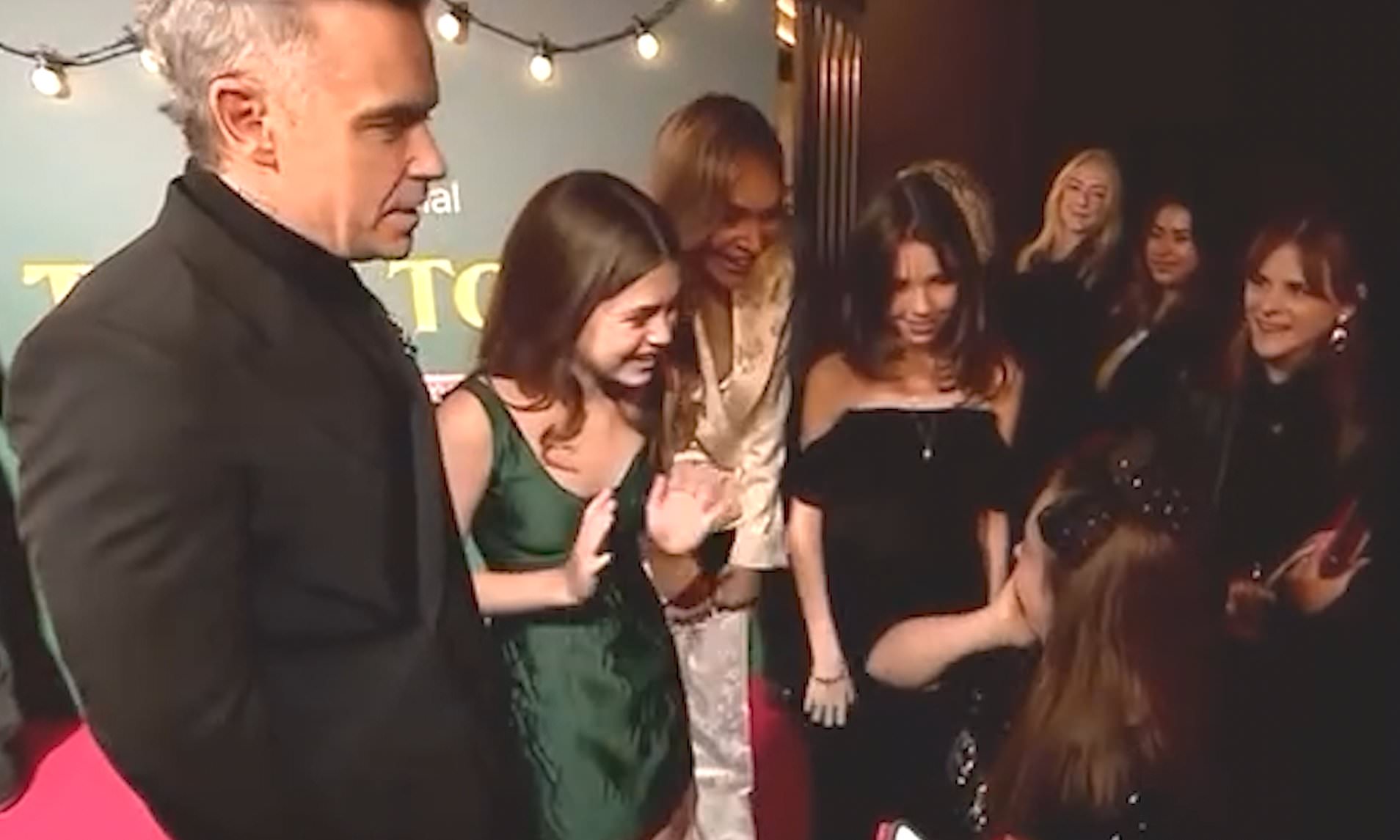Watch the heartwarming moment Robbie Williams' actress daughter Teddy ...