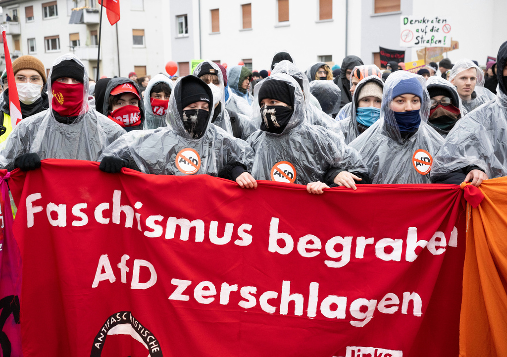German far-right party sets up its new youth wing as thousands protest