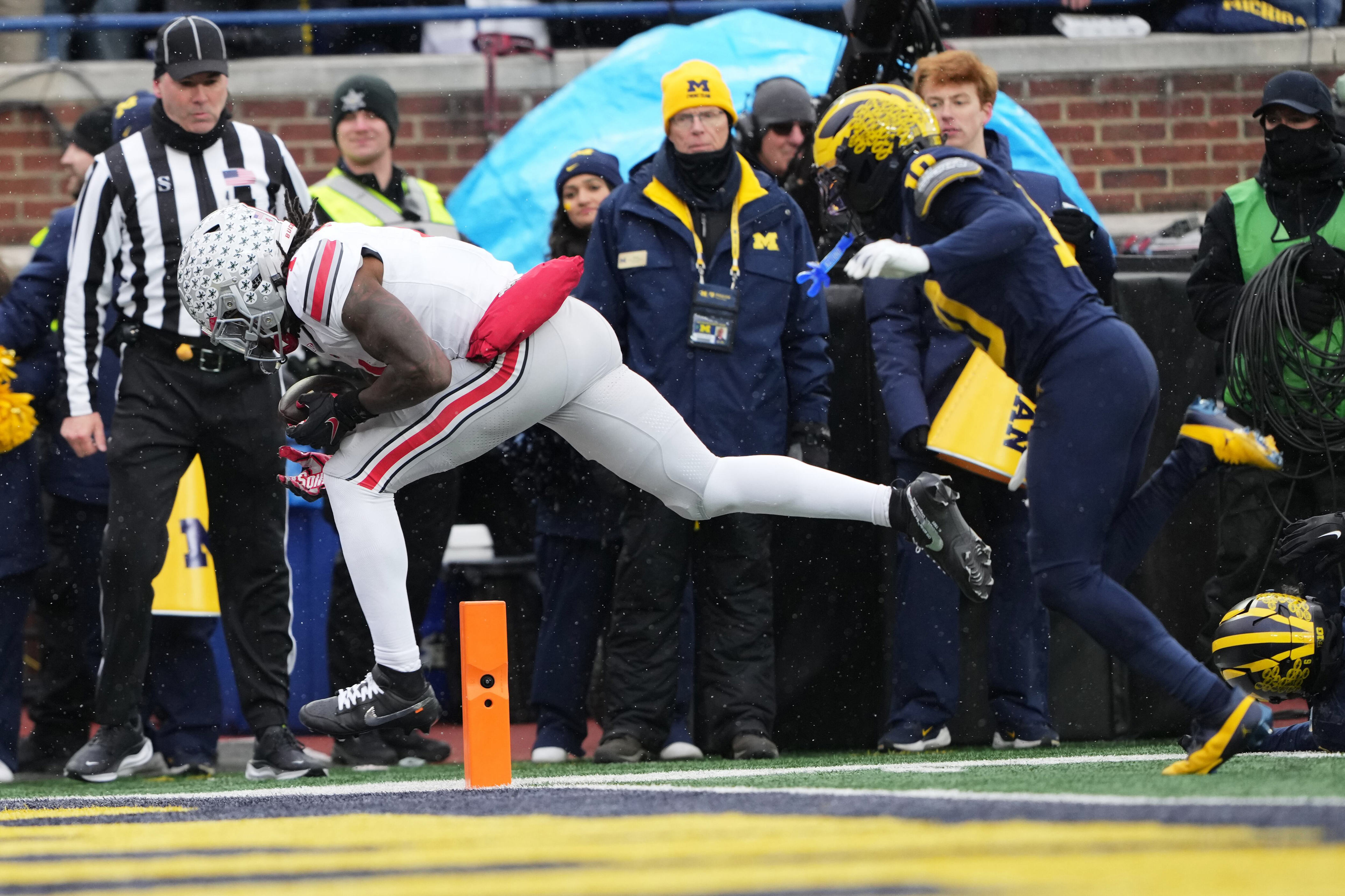 No. 1 Ohio State beats arch-rival Michigan, snaps 4-game losing streak