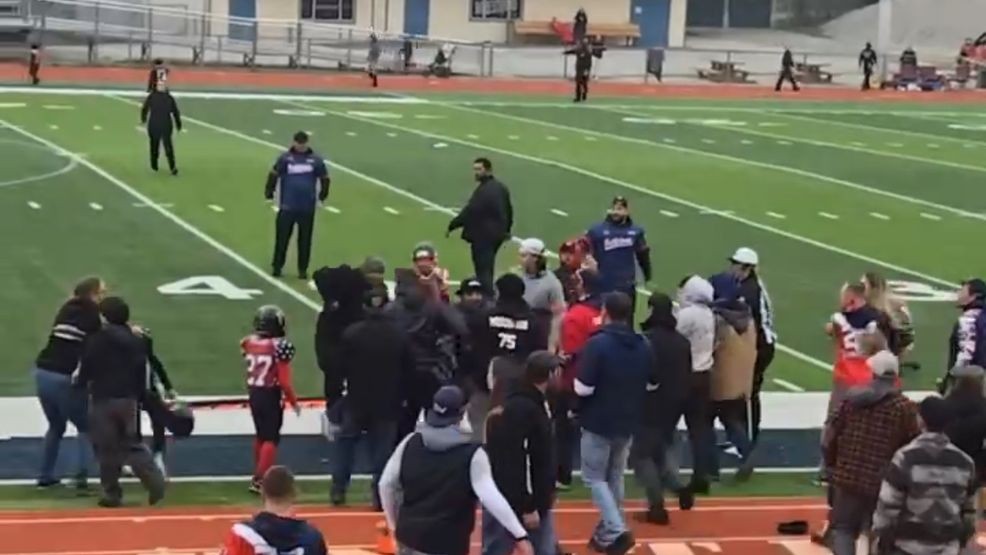Shocking brawl erupts at youth football game as irate parent charges ...