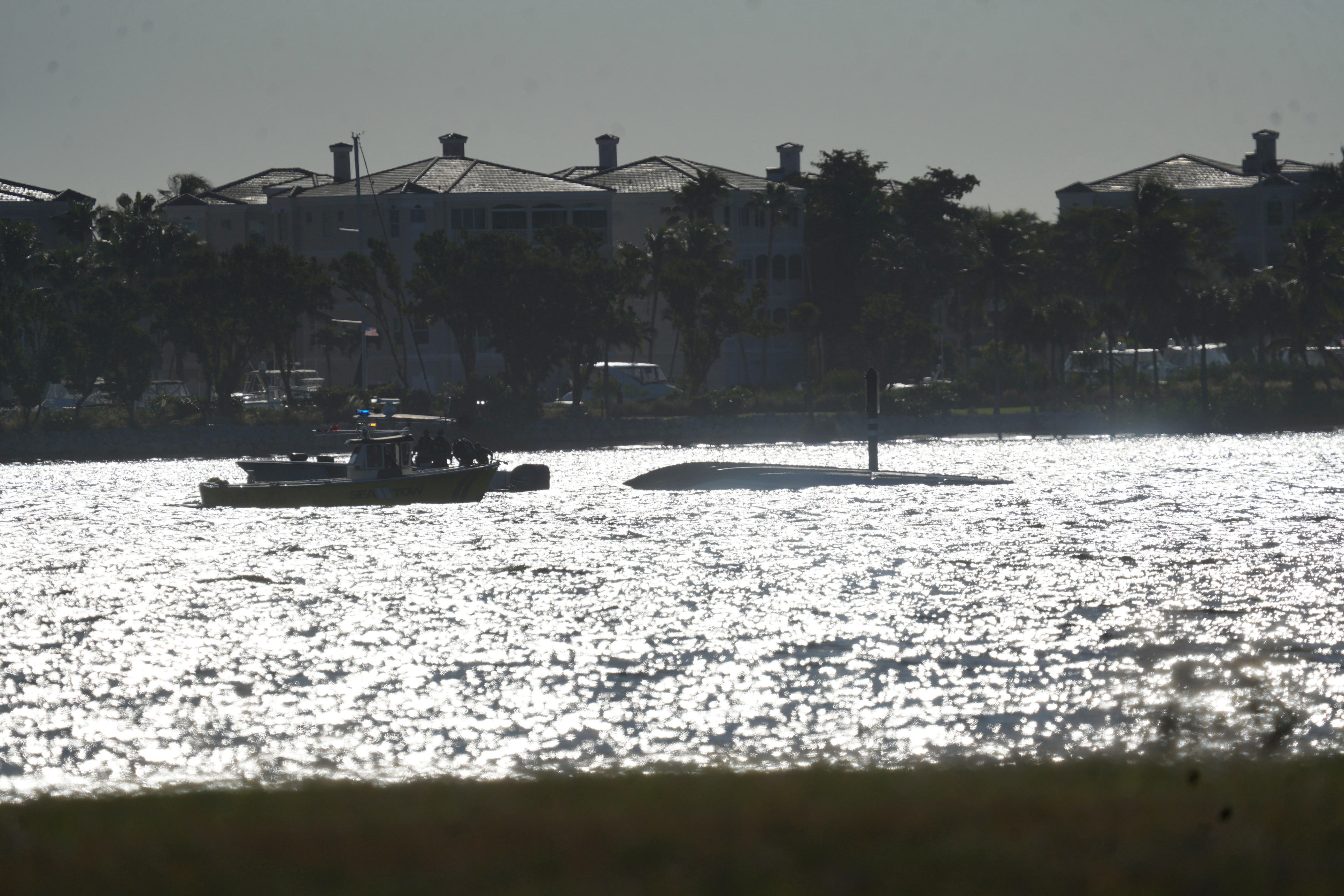 Photos: Flipped boat remains in Caloosahatchee River near Cape Coral