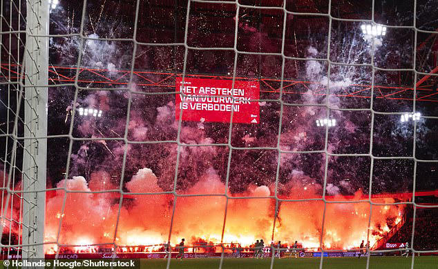 Carnage in Amsterdam as Ajax match is abandoned after HUGE explosion of ...