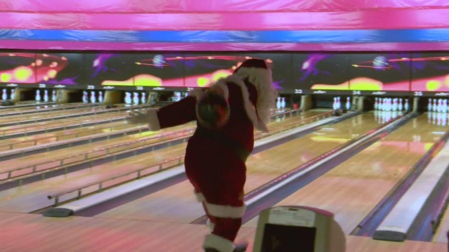 Knocking pins down with Santa at local bowling center