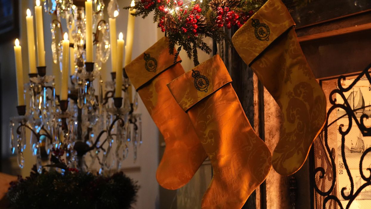Sandringham curtains recycled into festive stockings for royal charity ...
