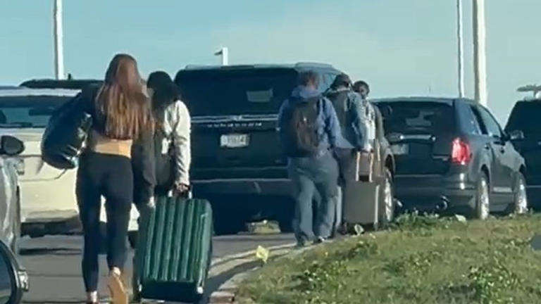 Travelers seen getting out of cars, walking to Nashville airport ...