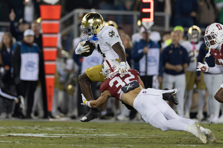 Big Ten championship game showcases Heisman Trophy favorites