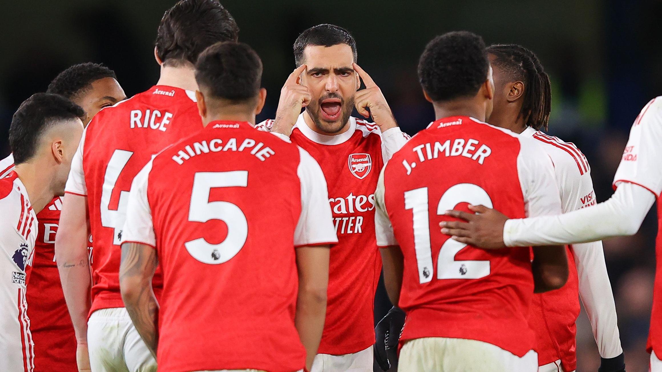 Merino header earns Arsenal point at 10-man Chelsea