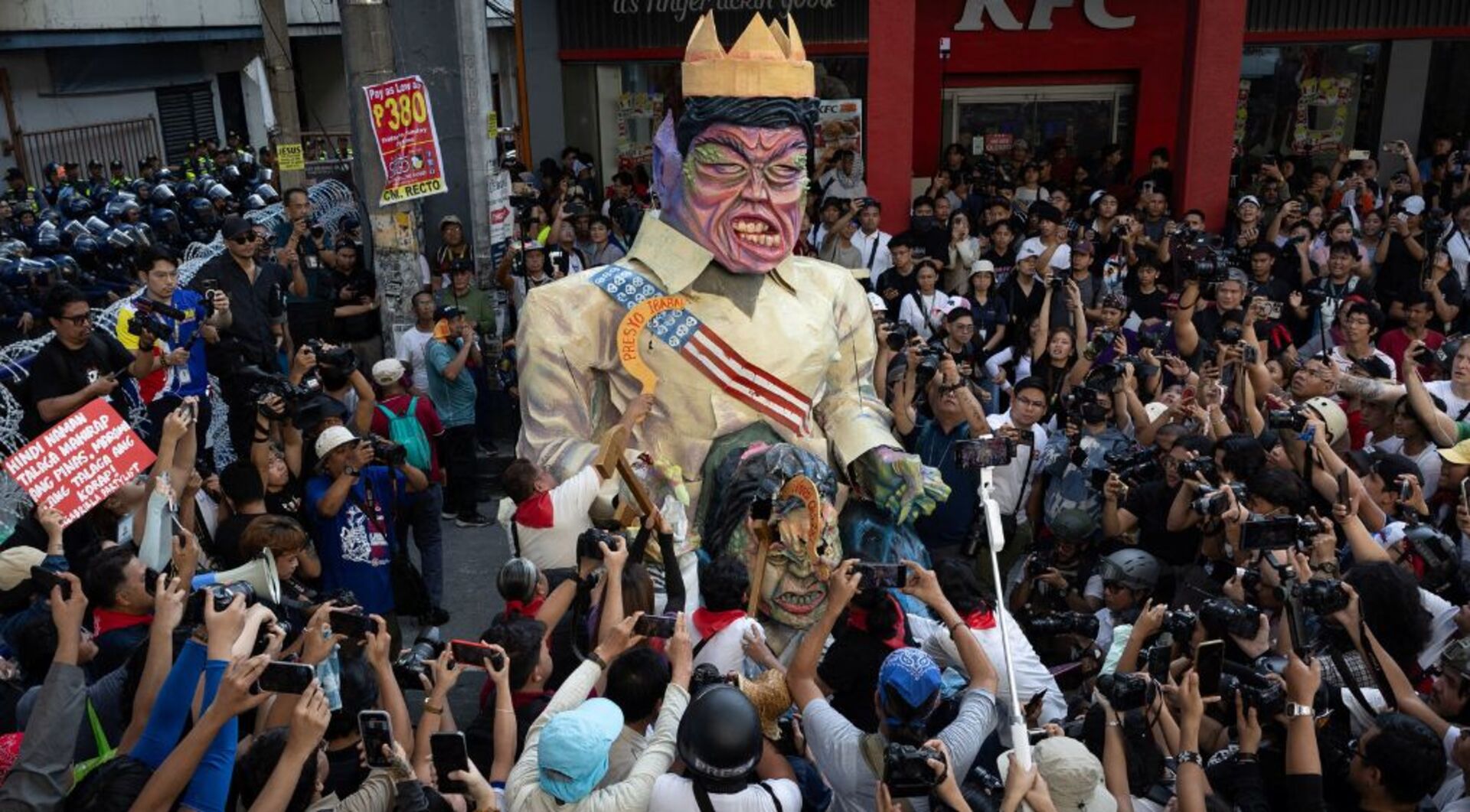 Thousands march in Philippines, demanding Marcos resign over fraud scandal