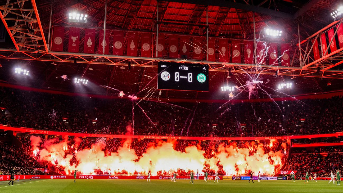 Ajax match abandoned after fireworks, flares set off in stands