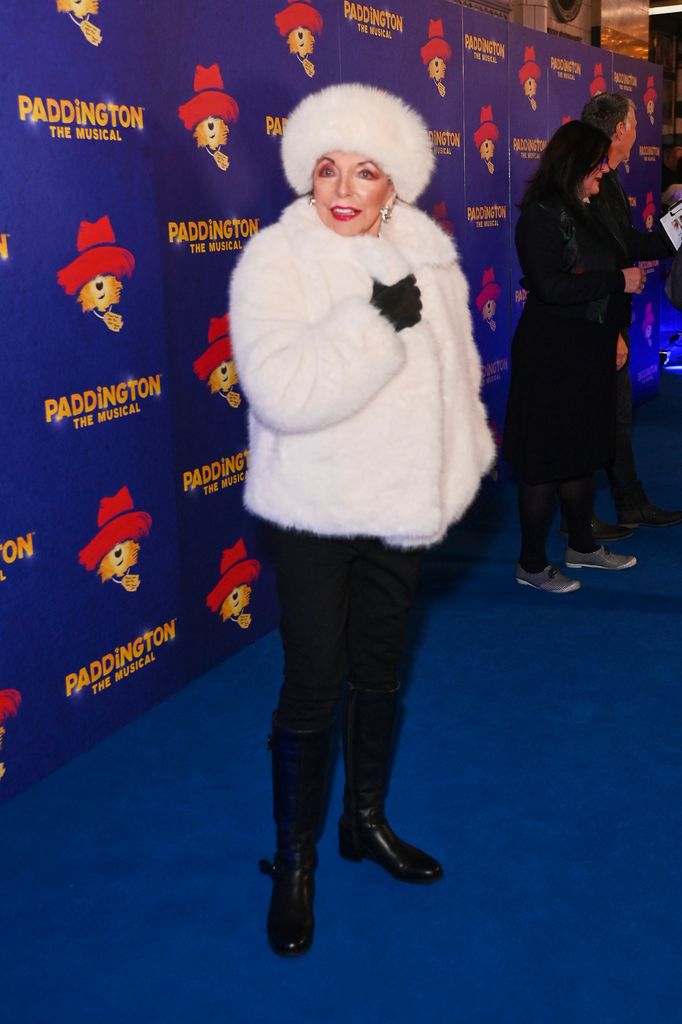 Joan Collins, 92, steals the show in latest blue carpet appearance