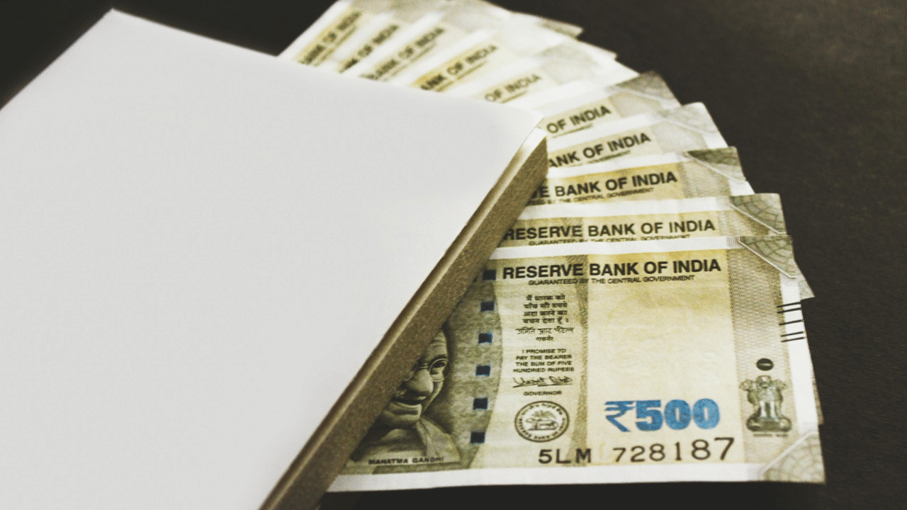 Rupee hits record low of 89.79 against US dollar