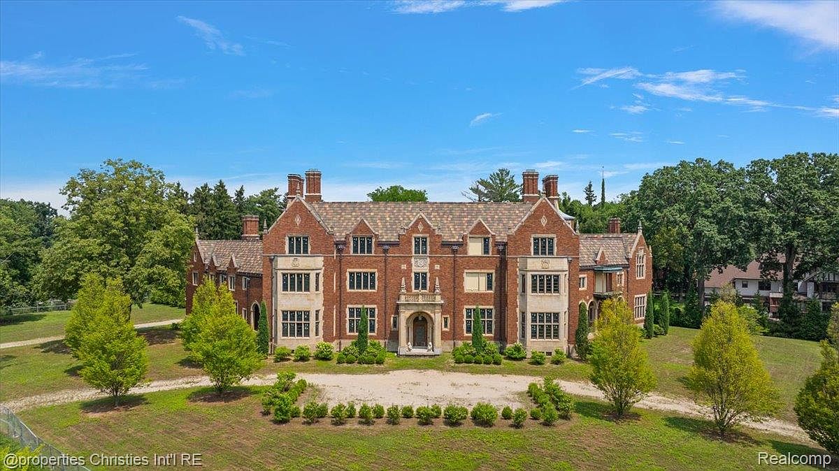 1920 Tudor Revival Mansion in Michigan: A Family Legacy Awaits with Stately Chapel & Expansive ...