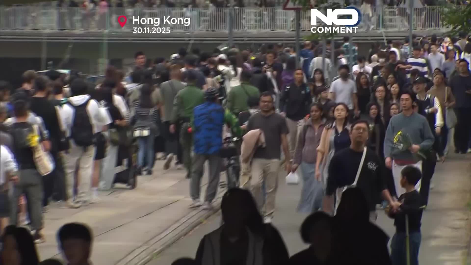 Hong Kong mourners queue to pay respects after deadly Tai Po fire