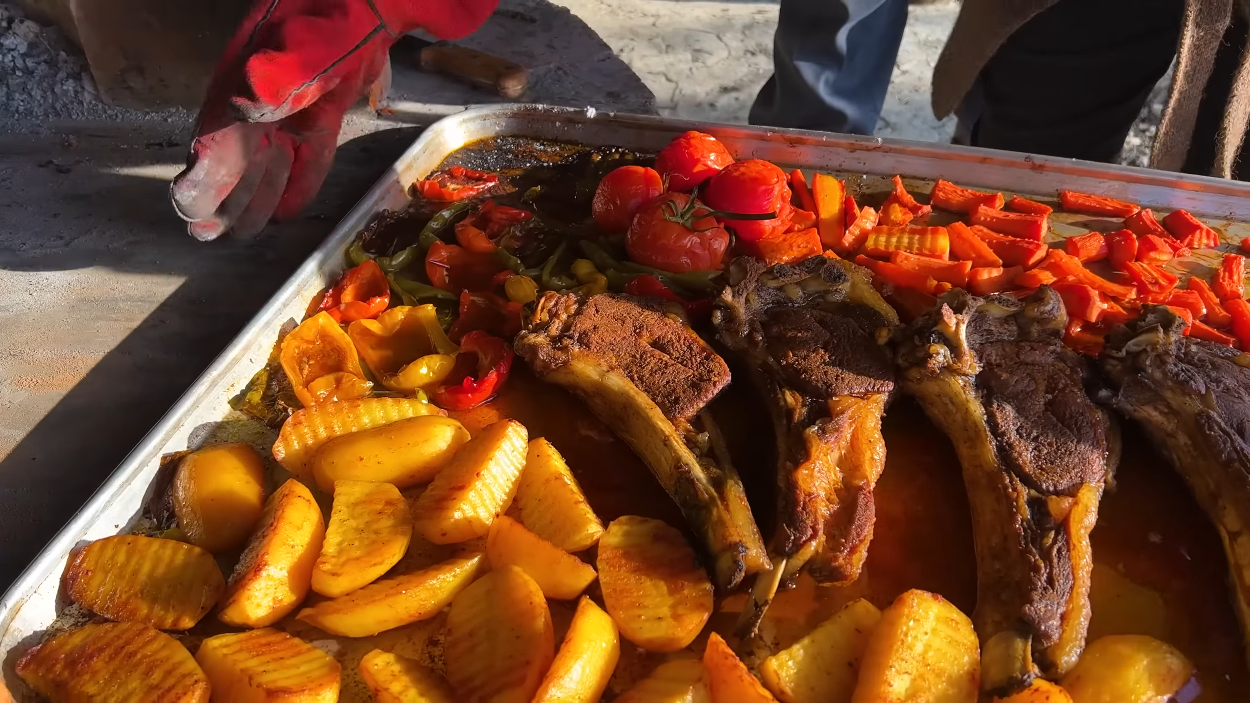 Cooking juicy beef steaks in a mountain village
