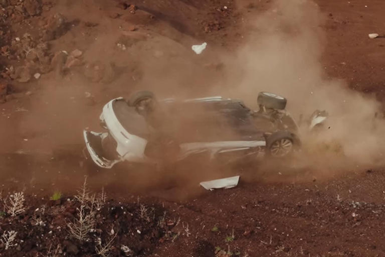 YouTuber Throws A Tesla Off A Cliff: The Viral Footage That Is Actually ...