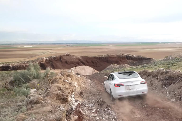 YouTuber Throws A Tesla Off A Cliff: The Viral Footage That Is Actually ...
