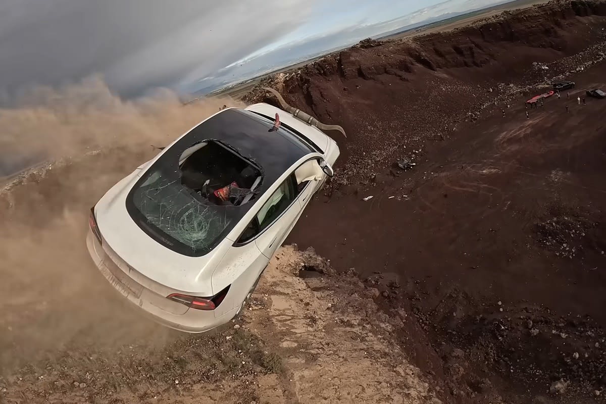YouTuber Throws A Tesla Off A Cliff: The Viral Footage That Is Actually ...