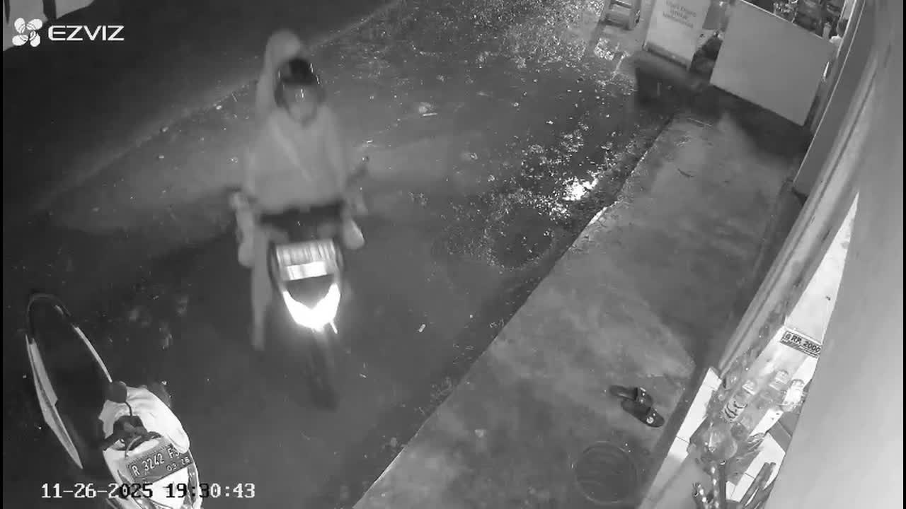 Motorcycle mishap leads to funny fall in Cilacap, Java, Indonesia