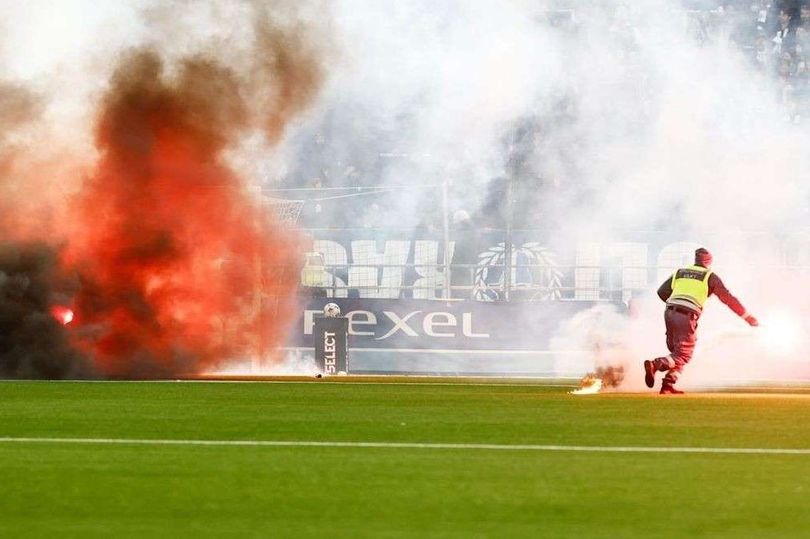 Football pitch on fire as referee and players flee match in ...