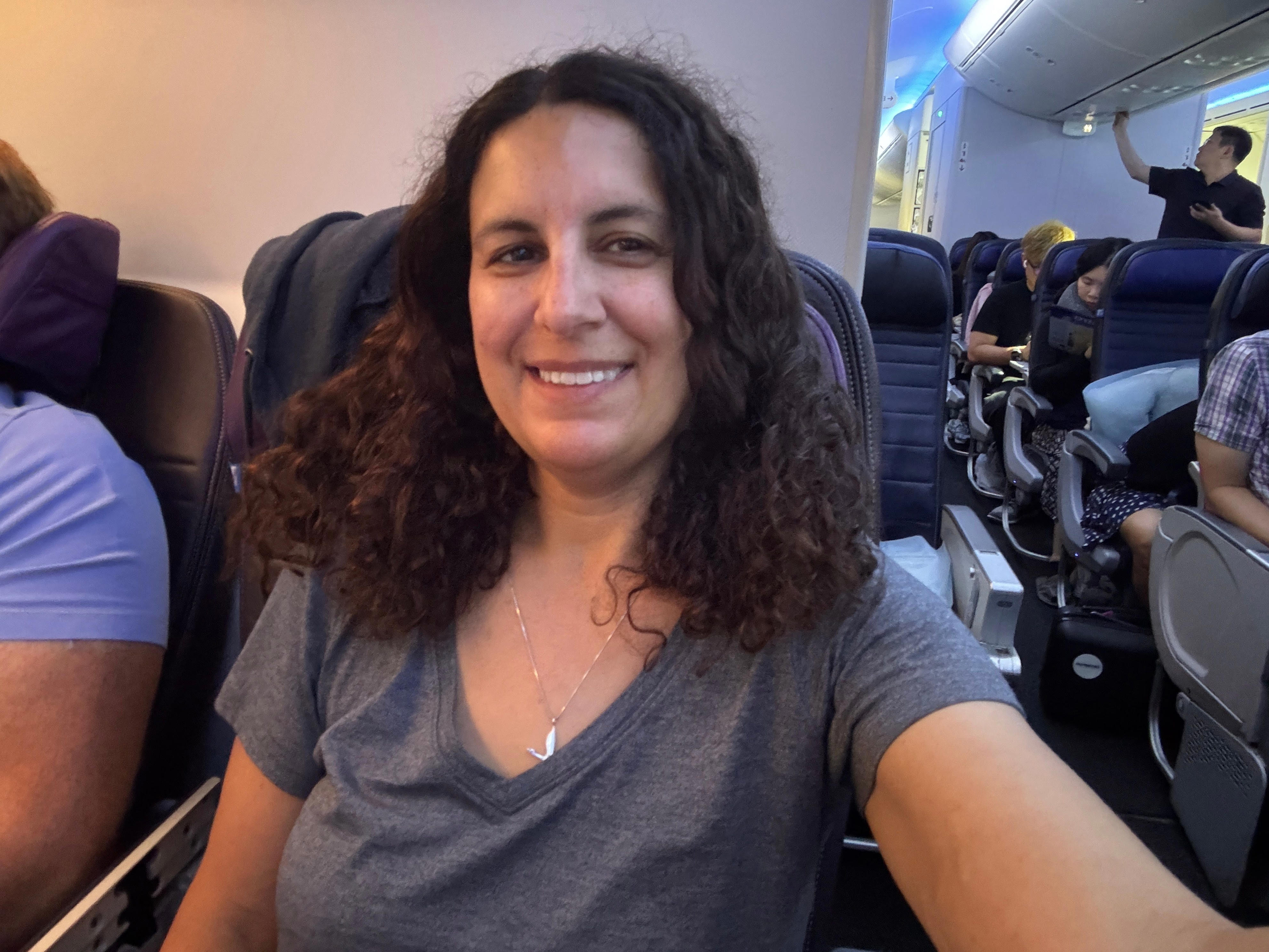 I upgraded to United's Premium Plus on a long flight. Most perks were ...