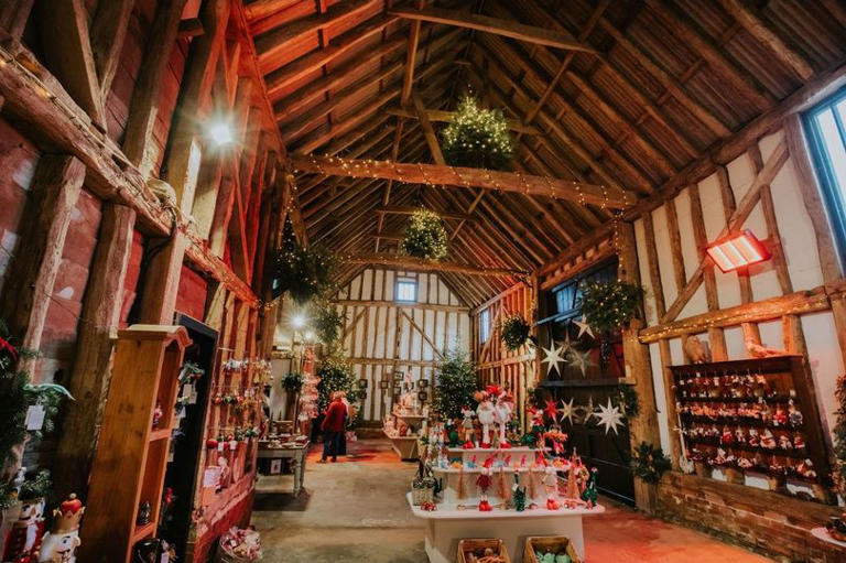 Magical Christmas barn opening in Essex with decorations, gifts and cake