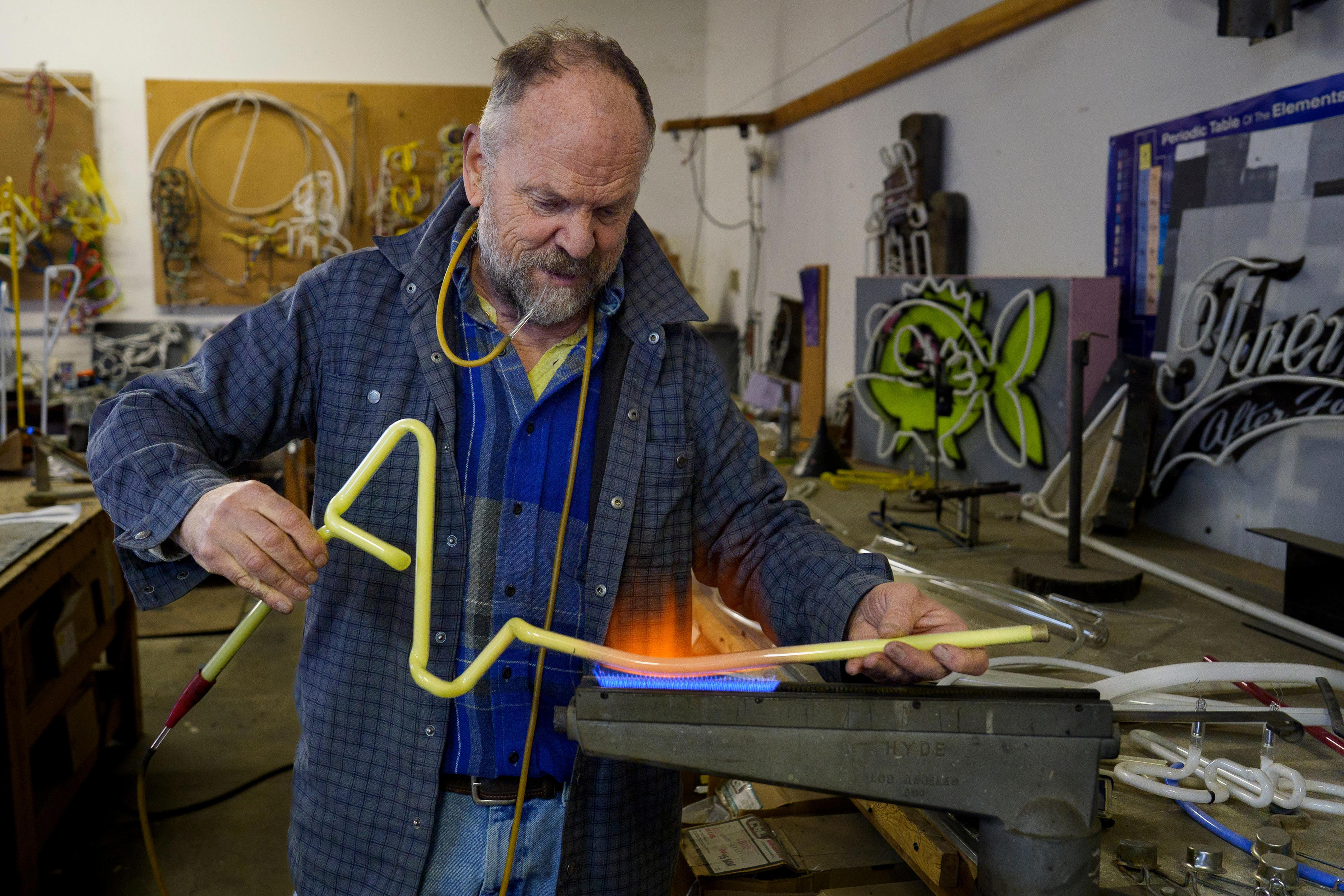 Meet Neal Conner who illuminates Eugene as Neon Man