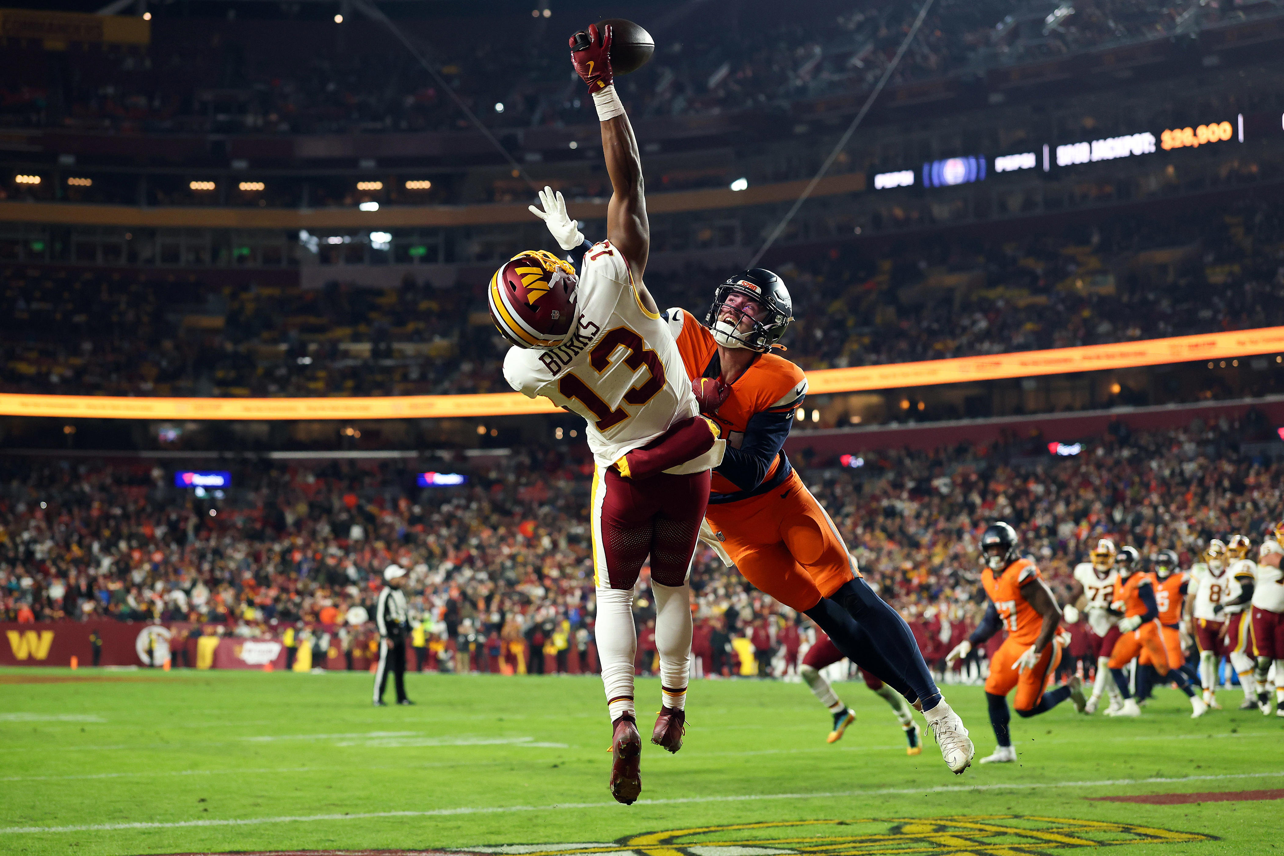 7 stunning Treylon Burks photos of his 'OBJ' 1-handed catch