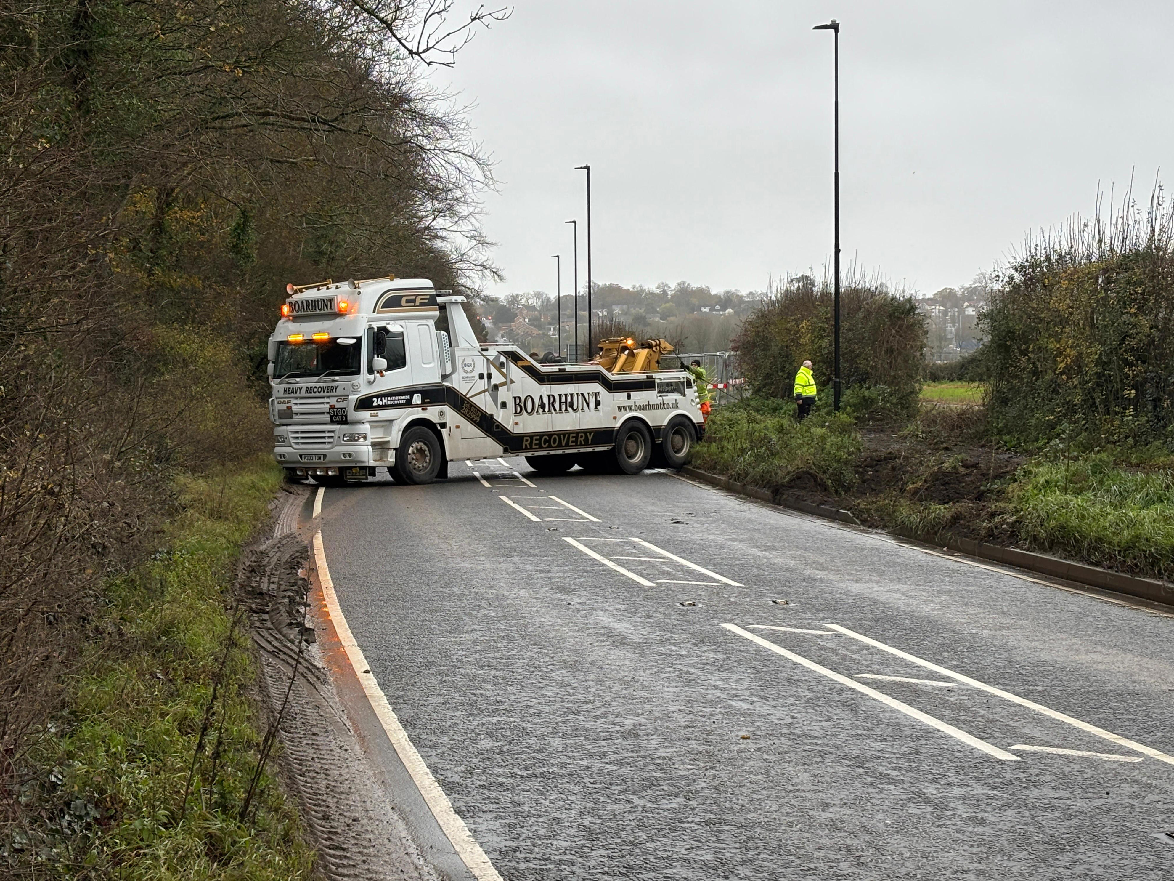 Road closure in place as truck tows TJ Transport lorry after it left ...