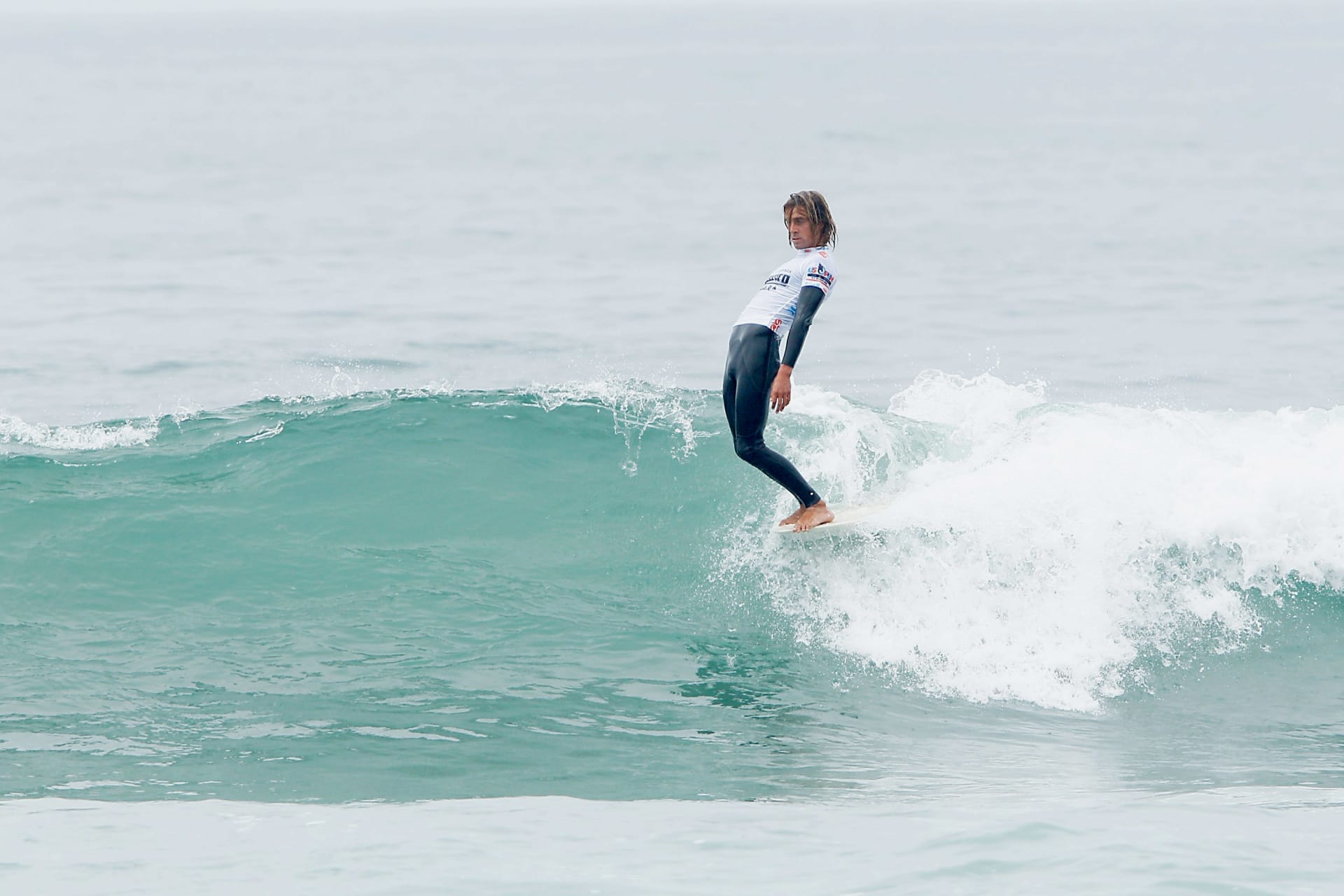 Surfing Lingo Explained: What Does It Mean To Hang Ten?