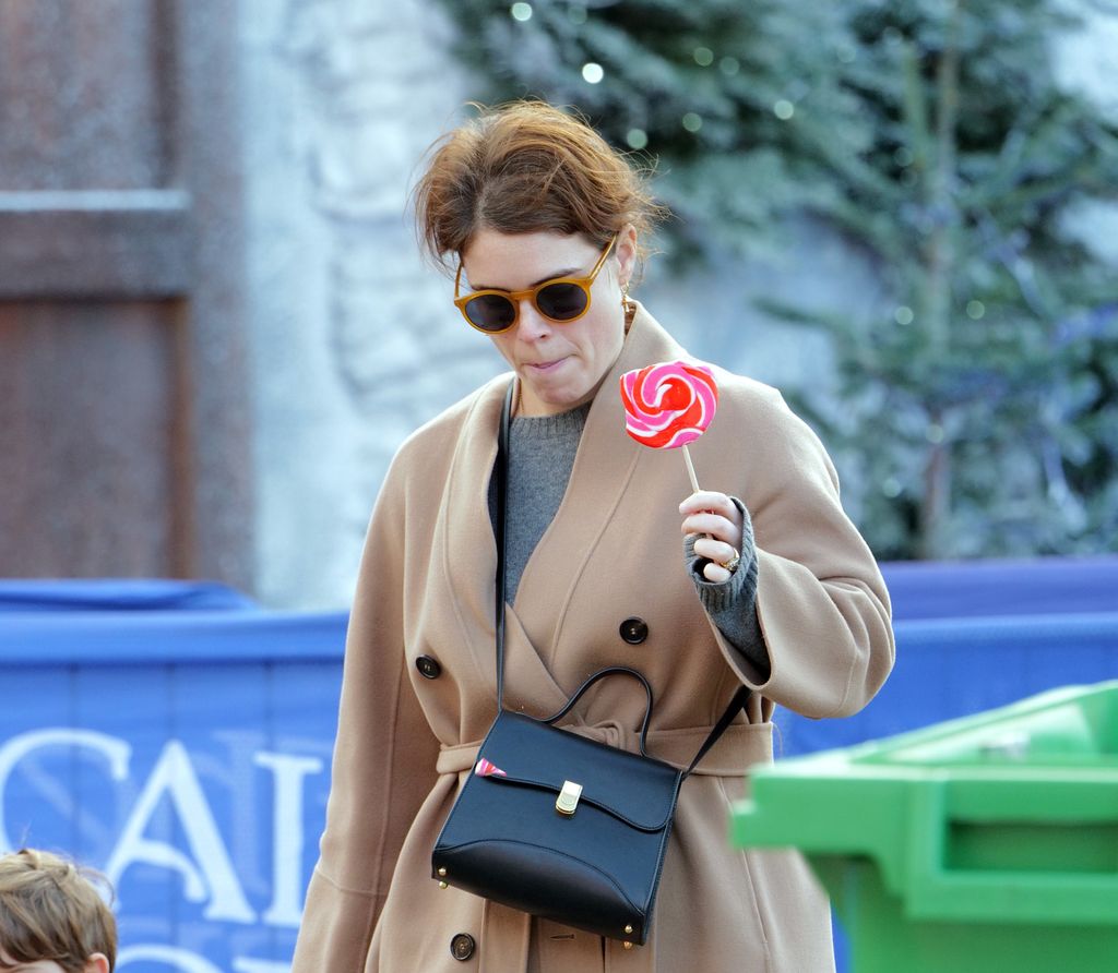 Princess Eugenie pictured with her mini me sons as she brushes off ...