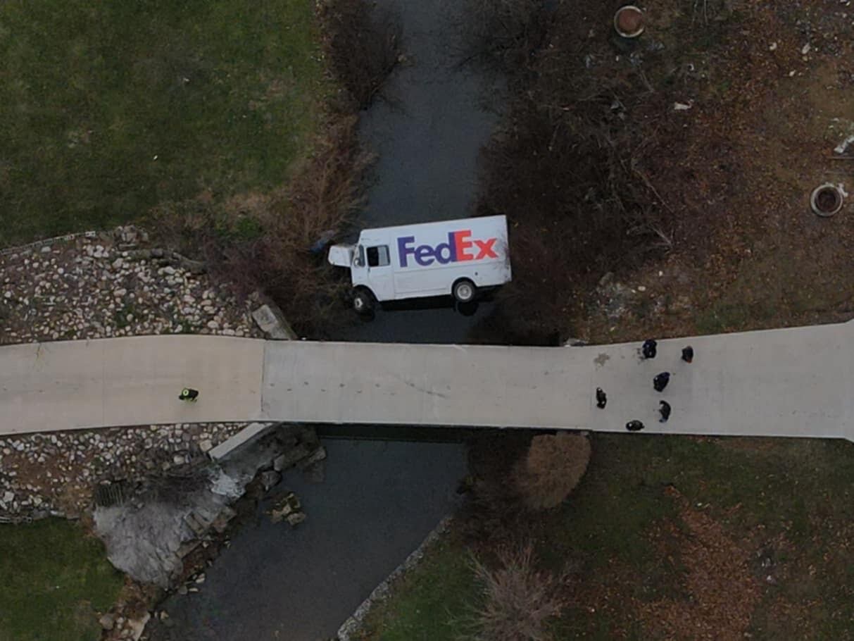 FedEx truck falls off bridge, lands in creek in Washington County