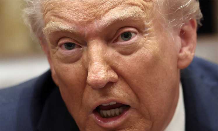 GOP deep red candidate hides association with 'toxic' Trump