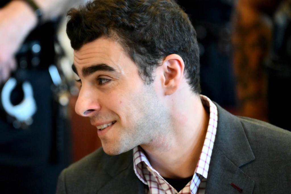 Luigi Mangione seen smiling in court