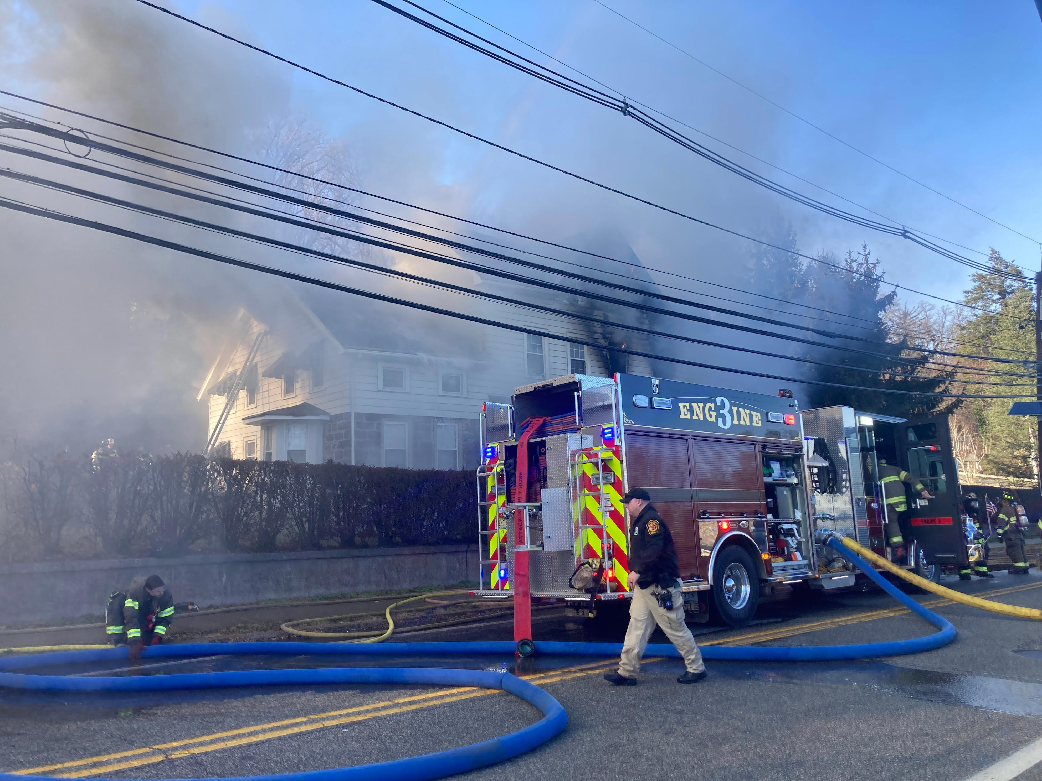 Heavy flames tear through house in Hawthorne
