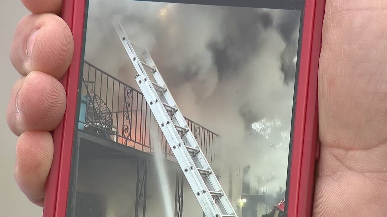 Atlanta firefighters rescue man trapped on burning balcony