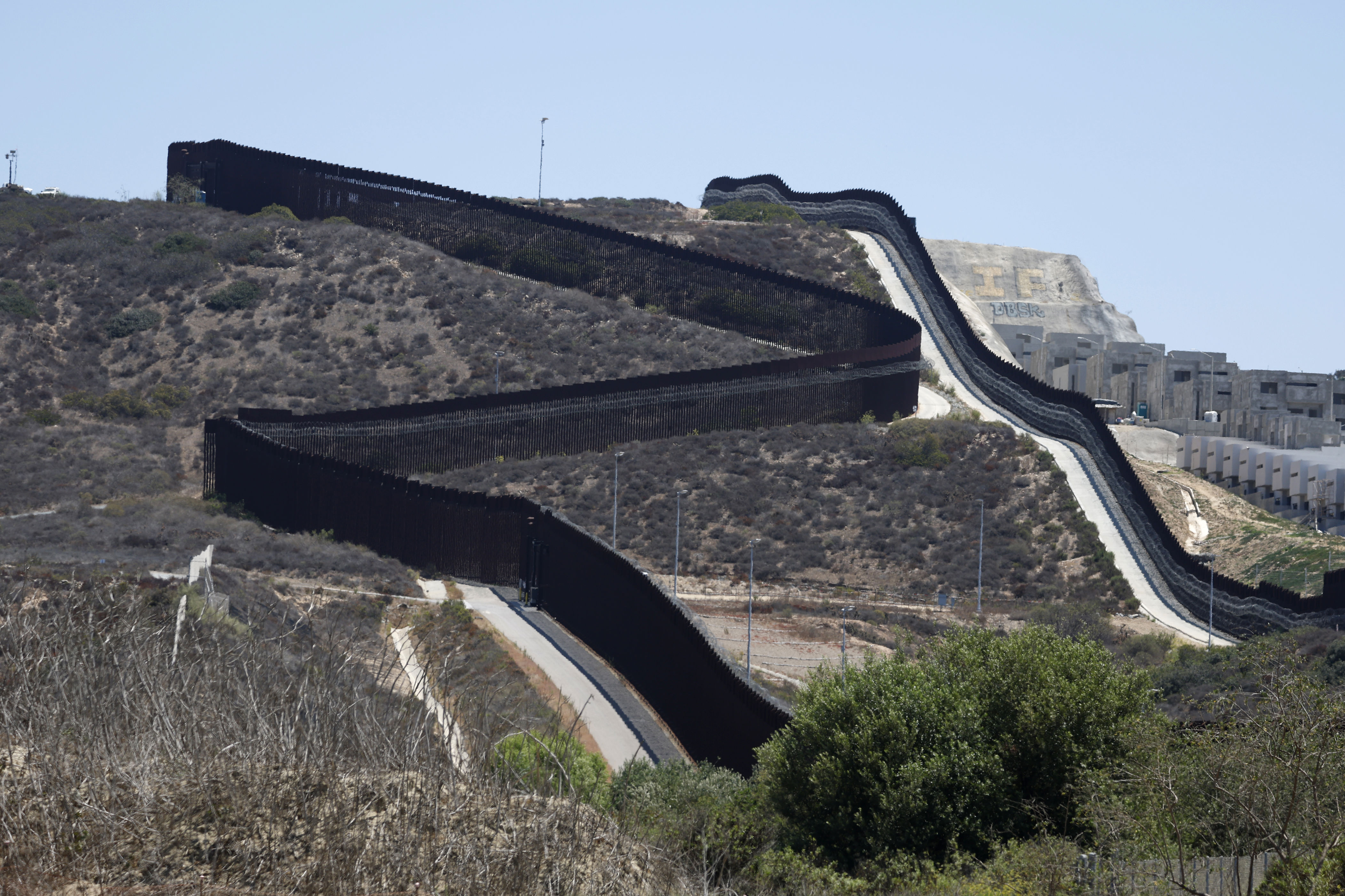 Three migrants fall from border wall in California: Report