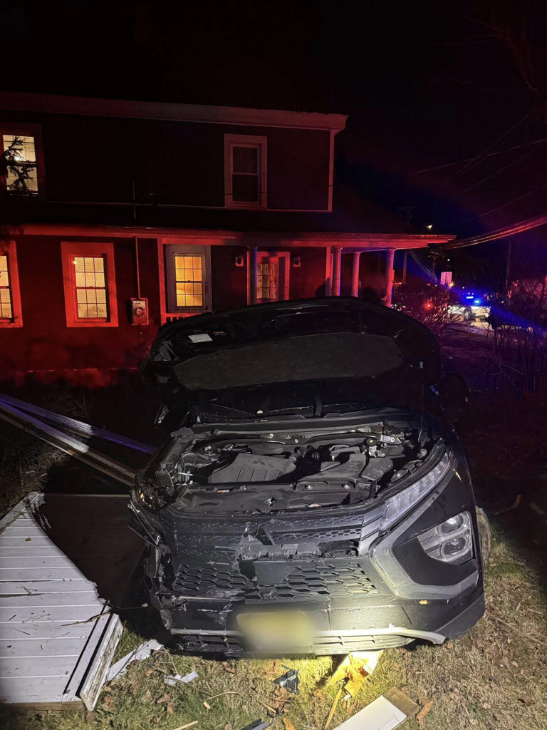 Car crashes into porch, fence in Plymouth