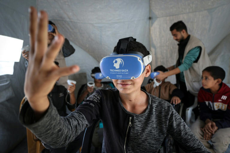 VR headsets take war-scarred children to world away from Gaza