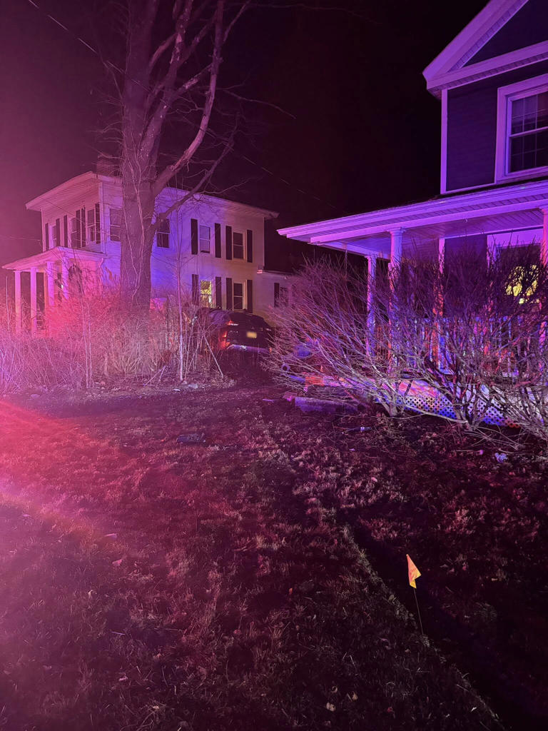 Car crashes into porch, fence in Plymouth