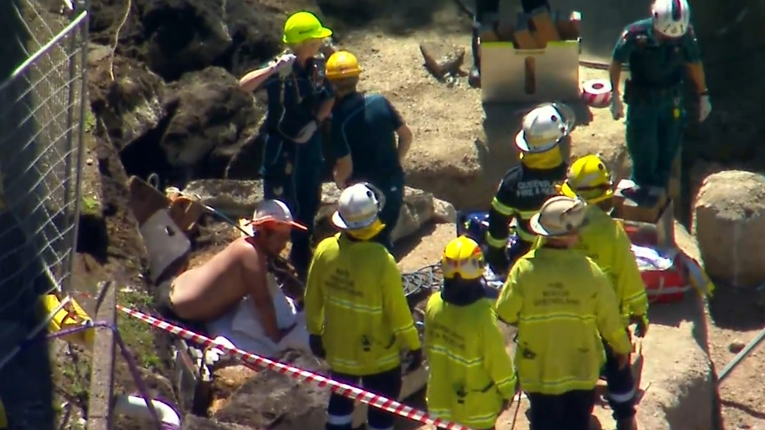 Man dies, colleagues save teen's life after Brisbane wall collapse