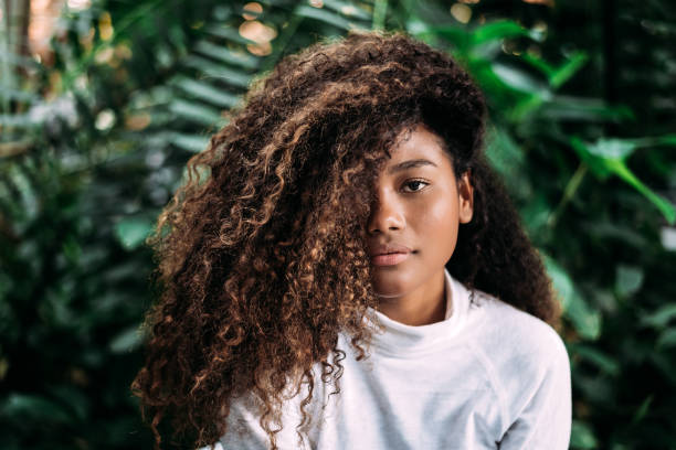 3 Huiles Essentielles Pour Les Cheveux Bouclés