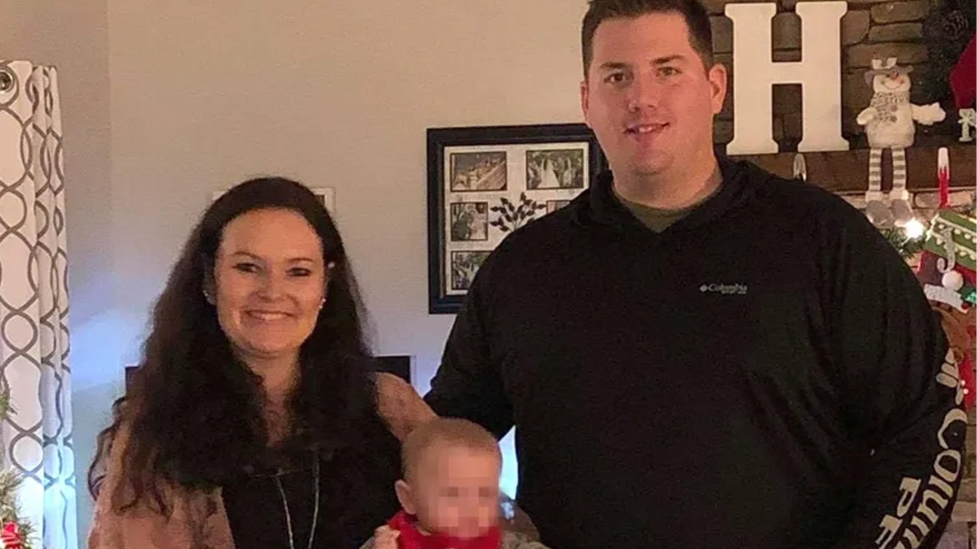 Parents found dead with toddler cuddling them