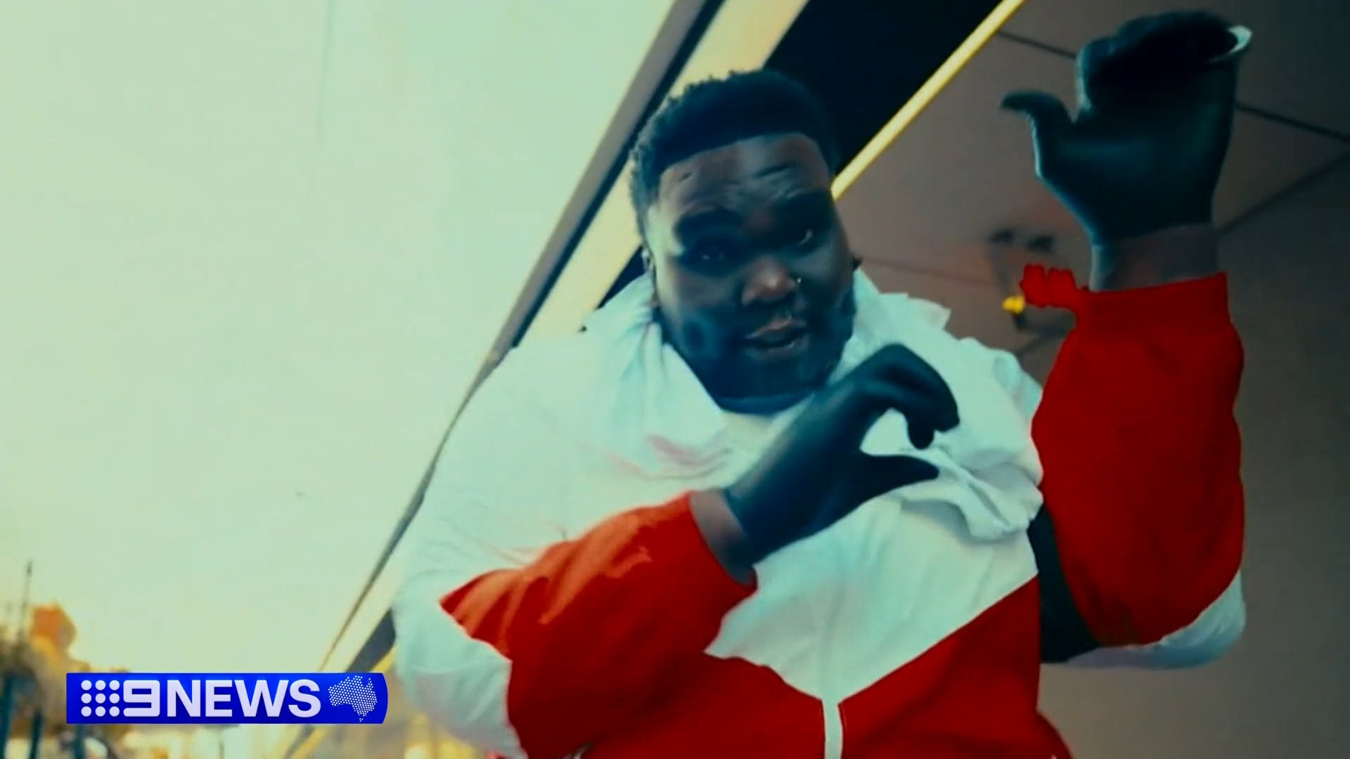 Rapper charged over Adelaide street fight