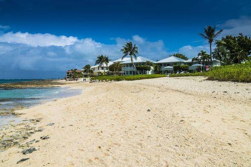 The beautiful British-owned island with white sand beaches and hardly ...