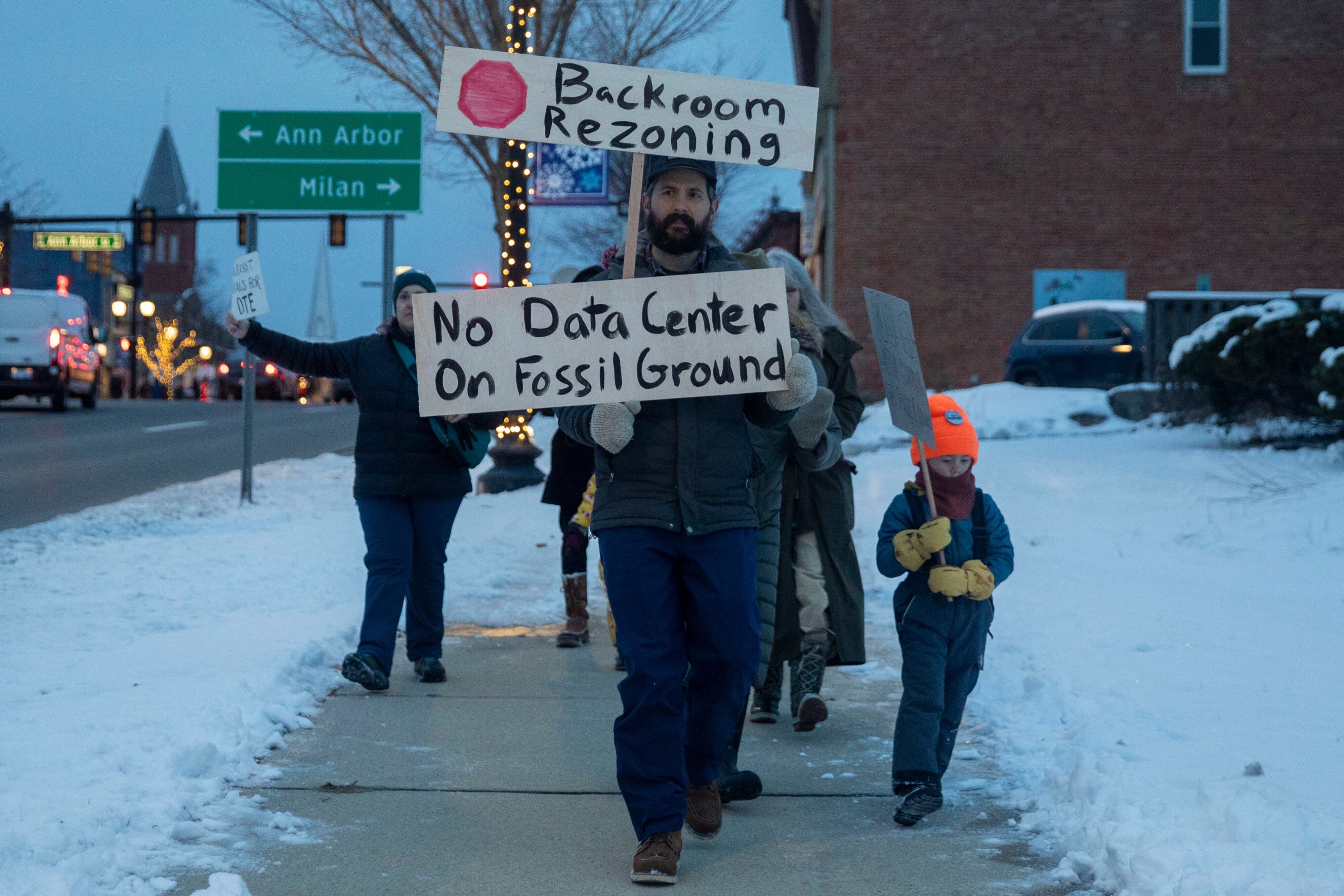 Protesters rally against DTE’s attempt to fast-track OpenAI, Oracle ...