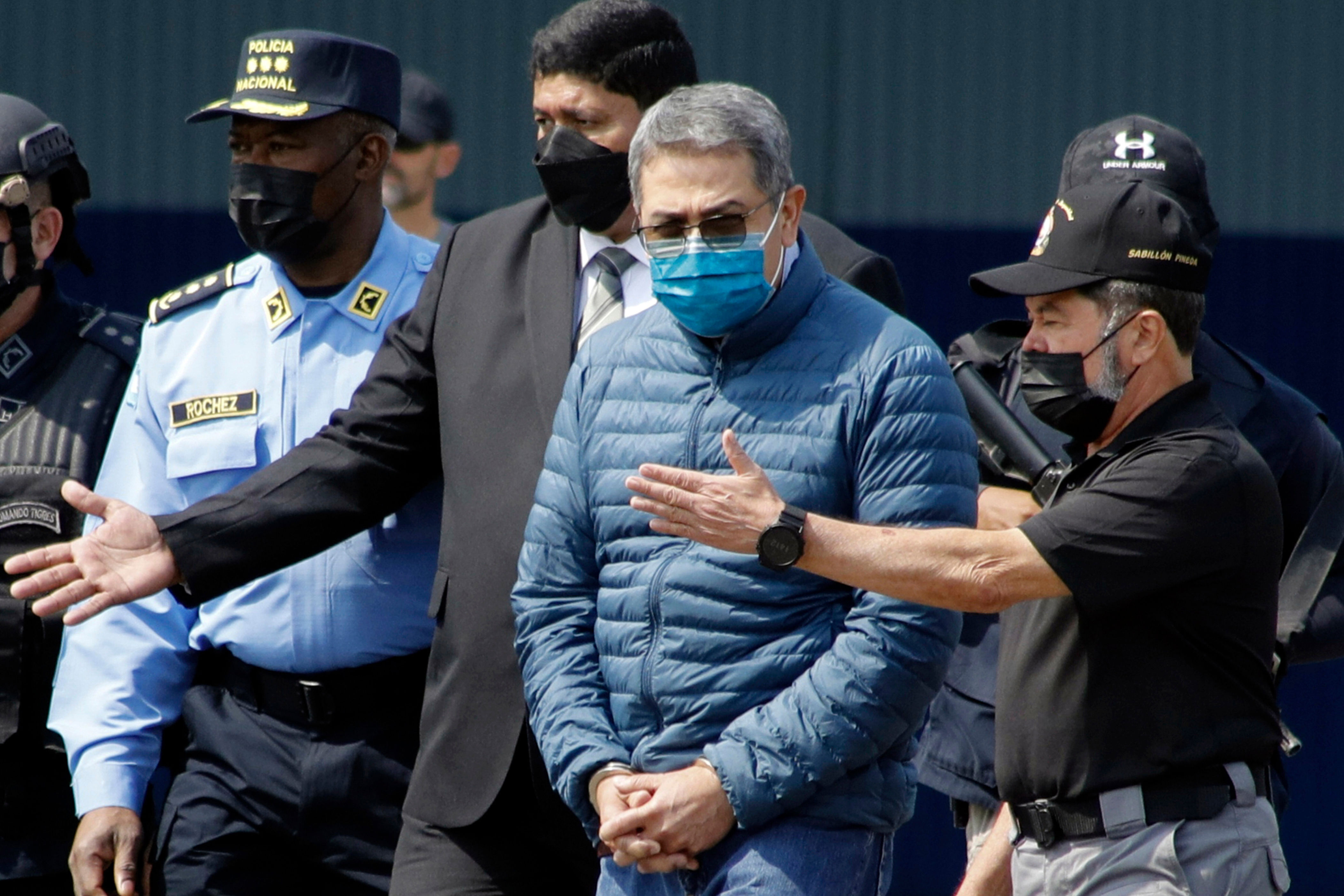 Honduras issues arrest warrant for ex-president Hernandez after US pardon
